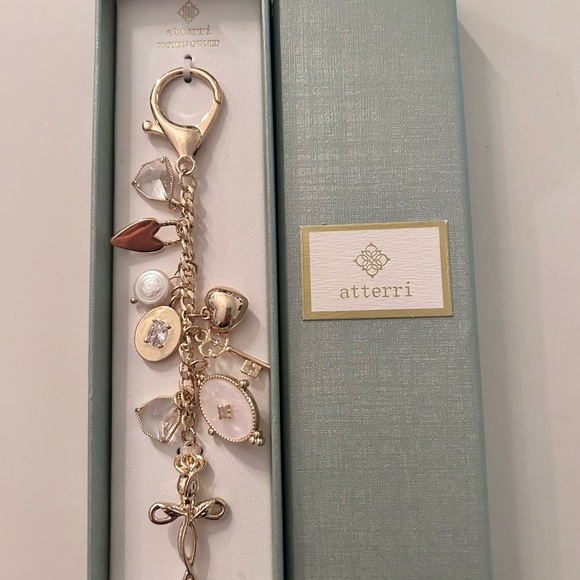 Atterri | Jewelry | Atterri Woman Owned Gold Tone 9 Pic Mobile Phone ...